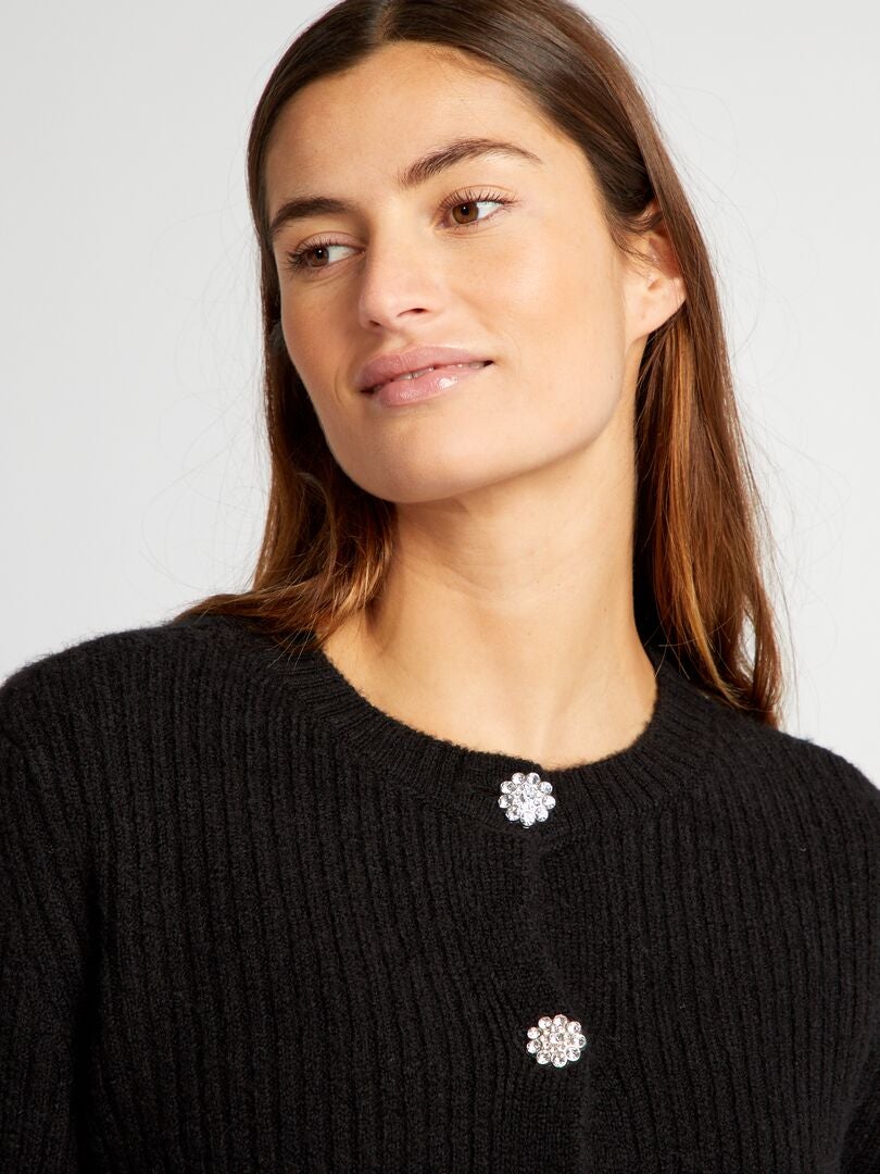 Kort vestje van ribstof met sieraardknoopjes - zwart - Kiabi - 25.00€